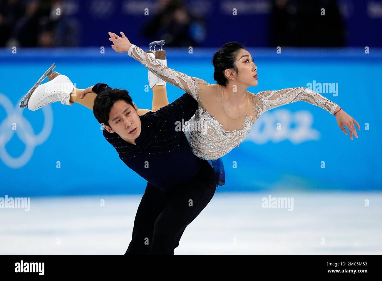 Sui Wenjing and Han Cong, of China, compete in the pairs free skate ...