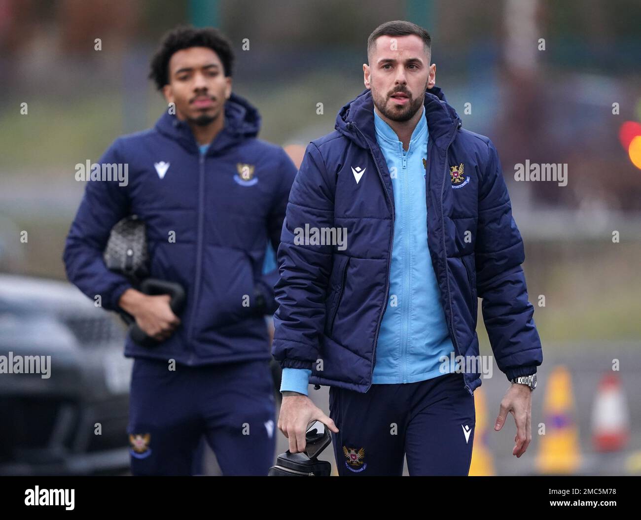 St Johnstone's Theo Bair and goalkeeper Remi Matthews arriving ahead of ...
