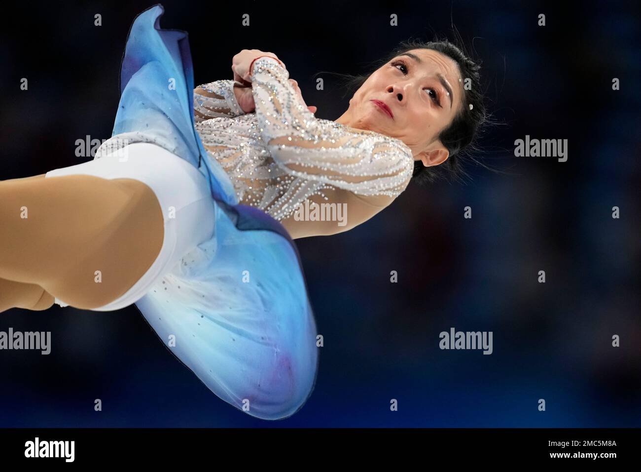 Sui Wenjing and Han Cong, of China, compete in the pairs free skate ...