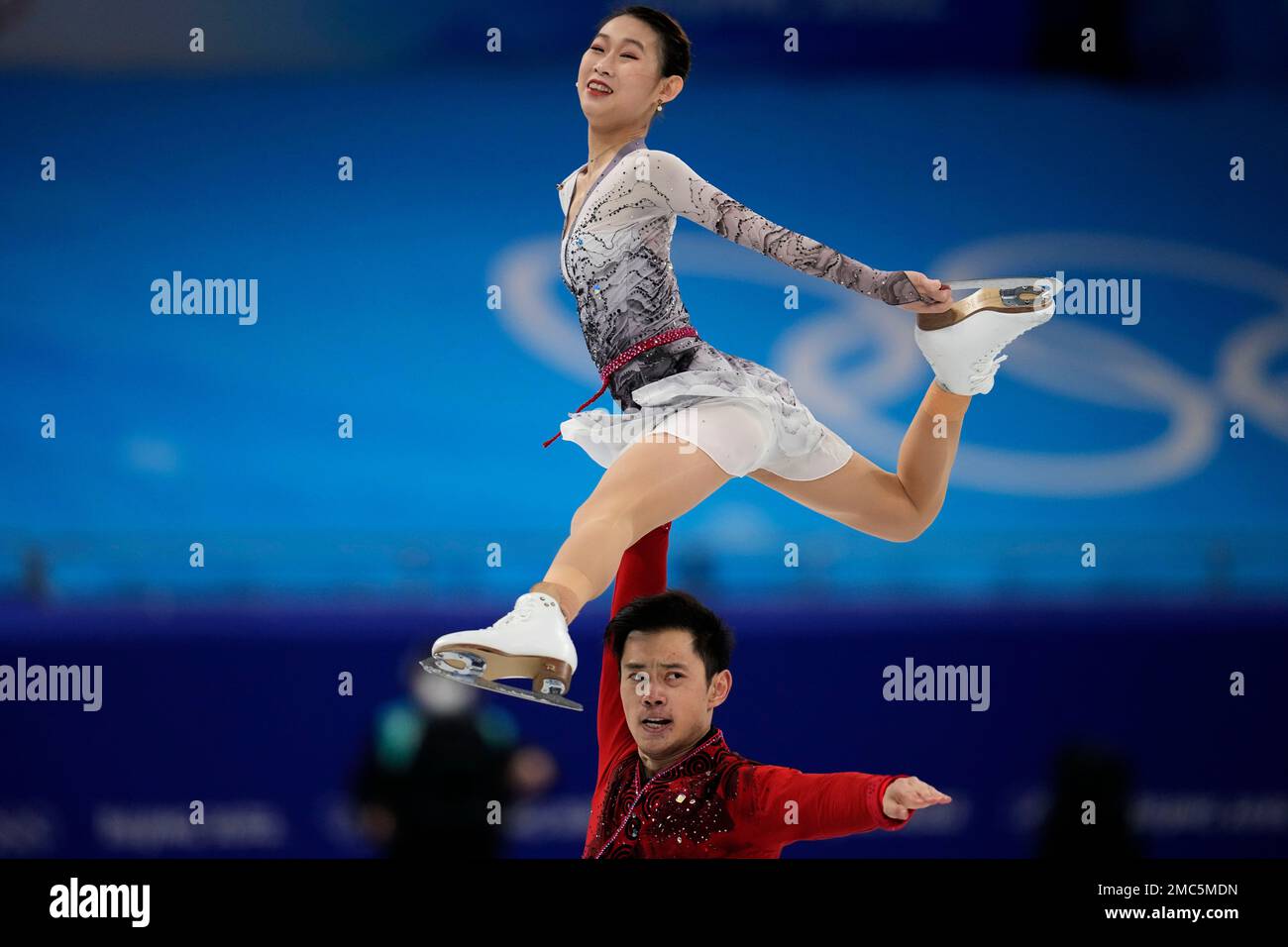 Peng Cheng and Jin Yang, of China, compete in the pairs free skate ...