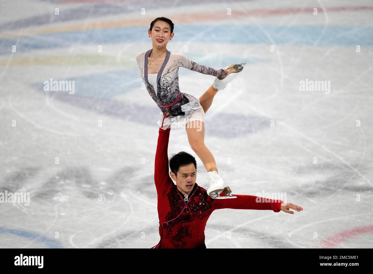 Peng Cheng and Jin Yang, of China, compete in the pairs free skate ...