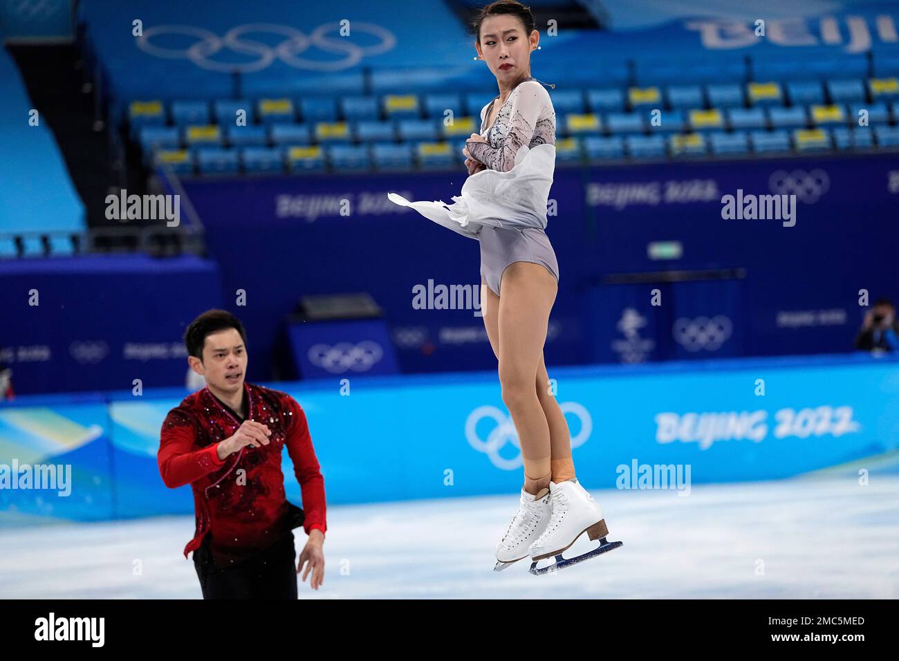 Peng Cheng and Jin Yang, of China, compete in the pairs free skate ...
