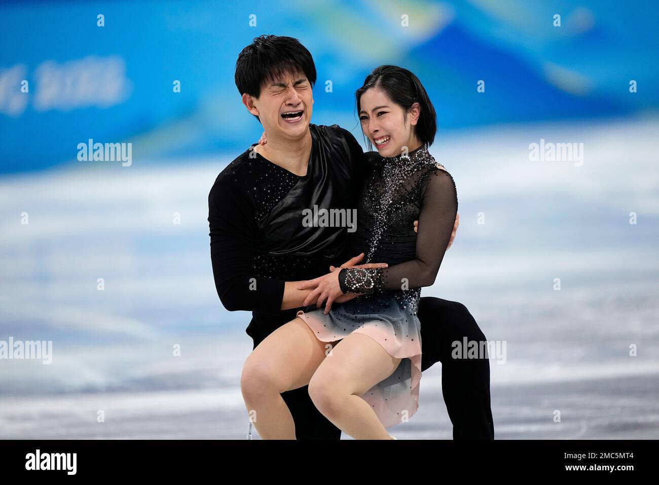 Riku Miura and Ryuichi Kihara, of Japan, compete in the pairs free ...