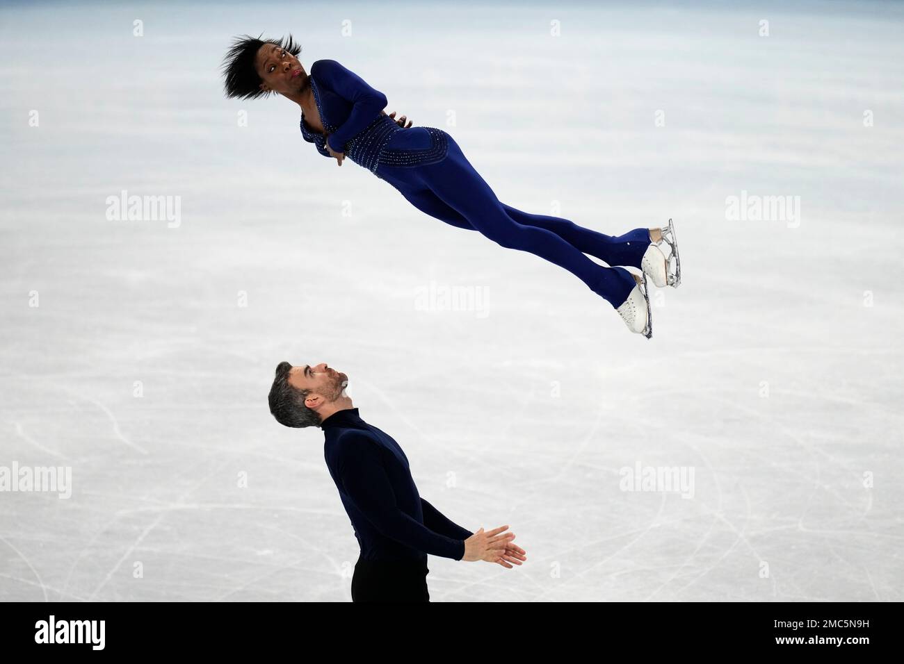 Vanessa James and Eric Radford, of Canada, compete in the pairs free ...