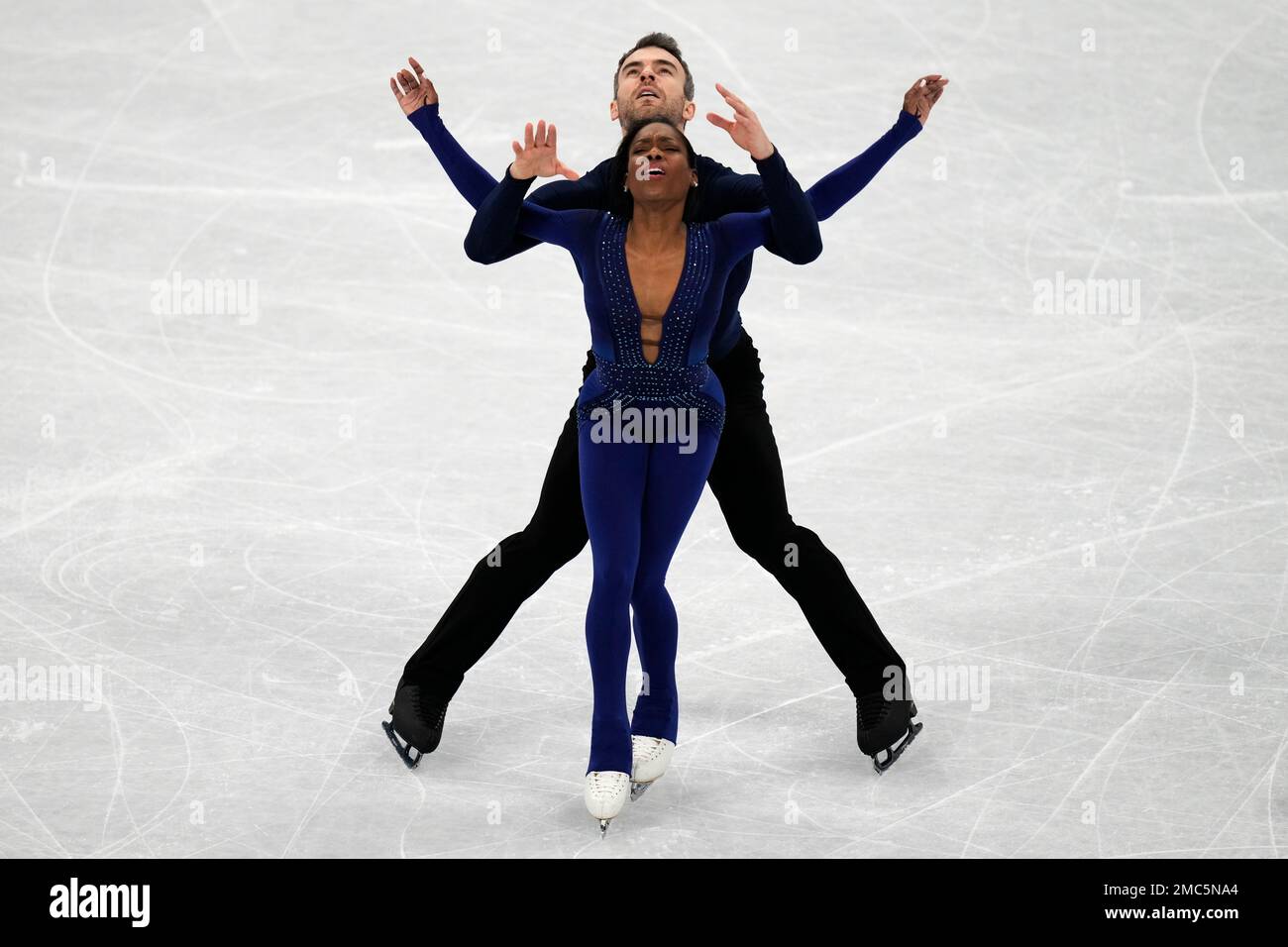Vanessa James and Eric Radford, of Canada, compete in the pairs free ...