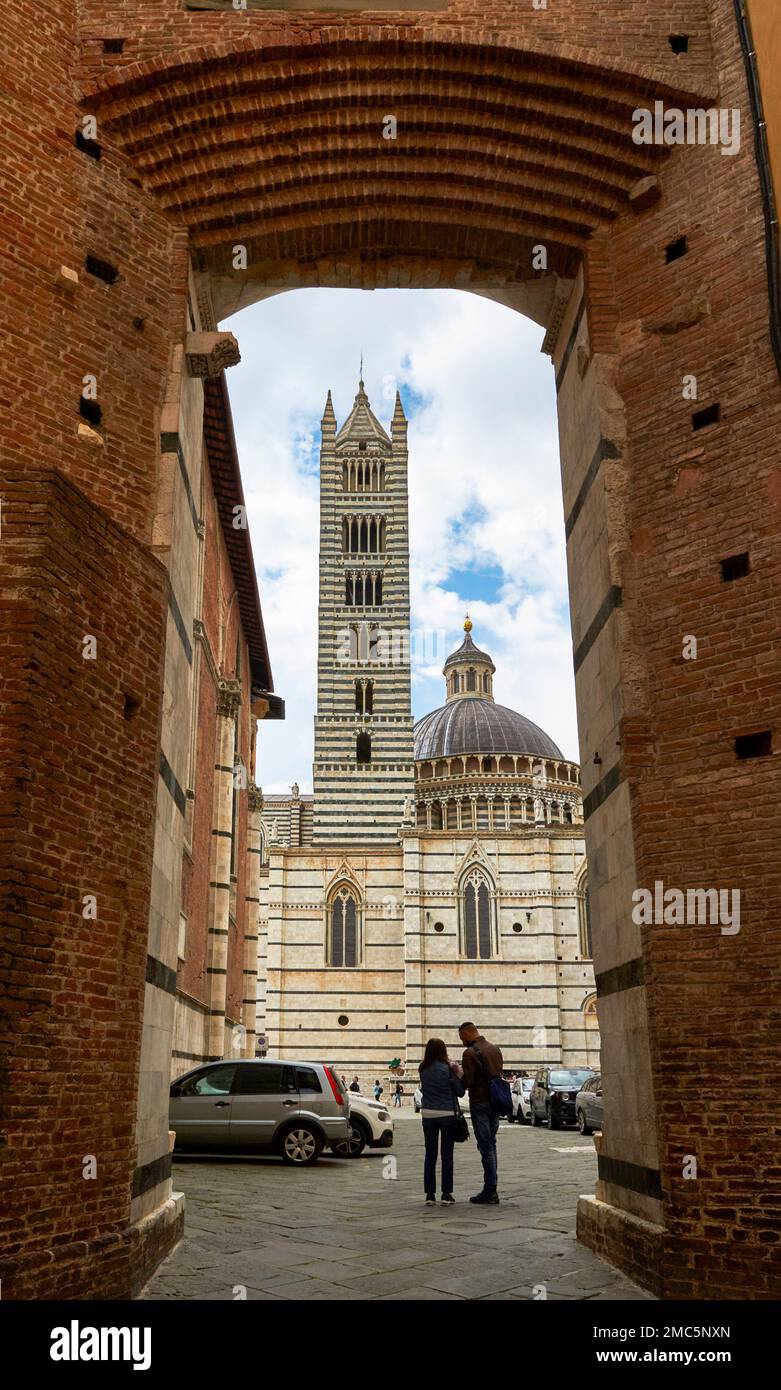 At the entrance to Piazza del Duomo in the Old town of Siena, Italy ...