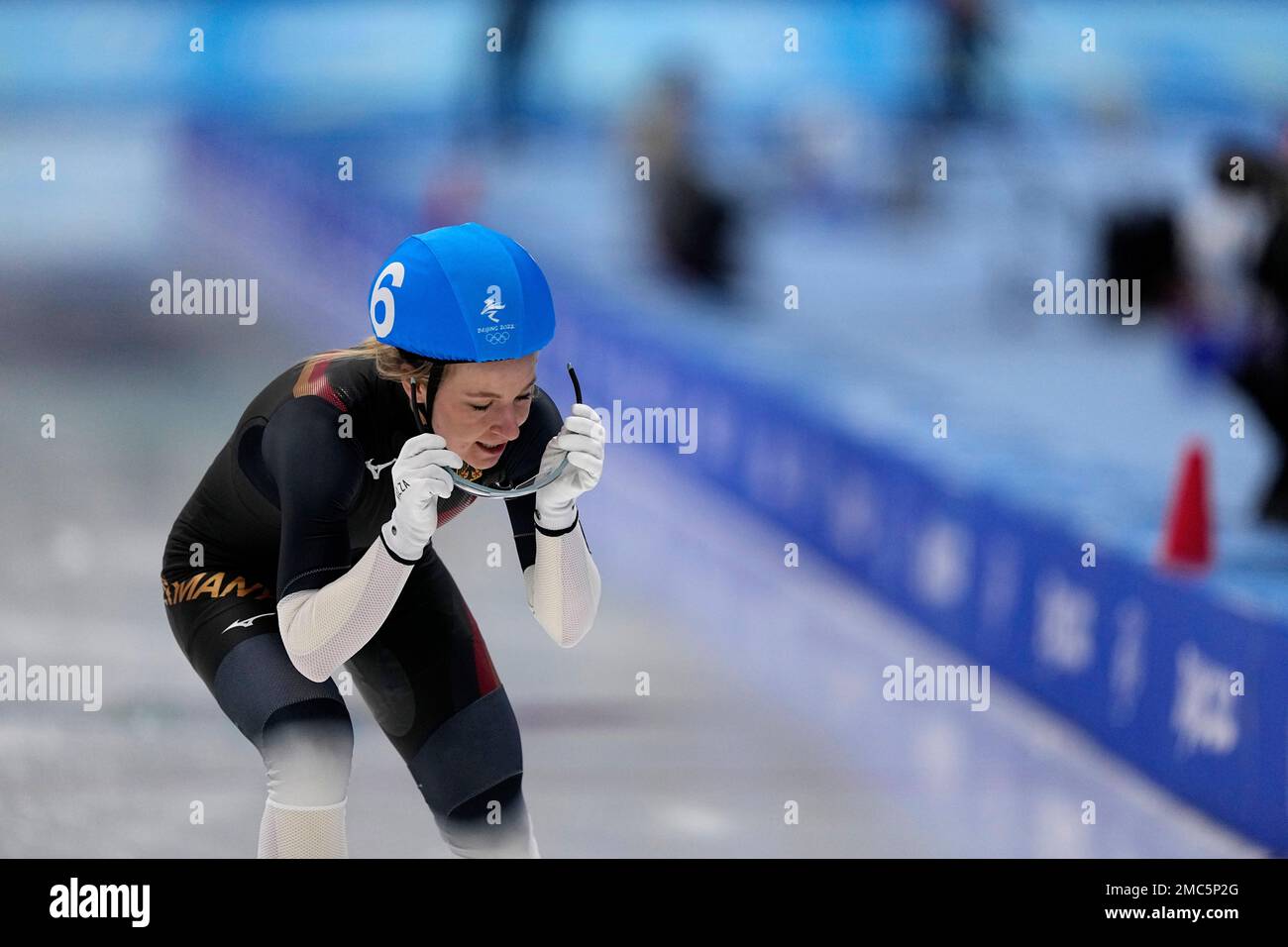 Michelle Uhrig of Germany pick up her glasses after falling during the ...