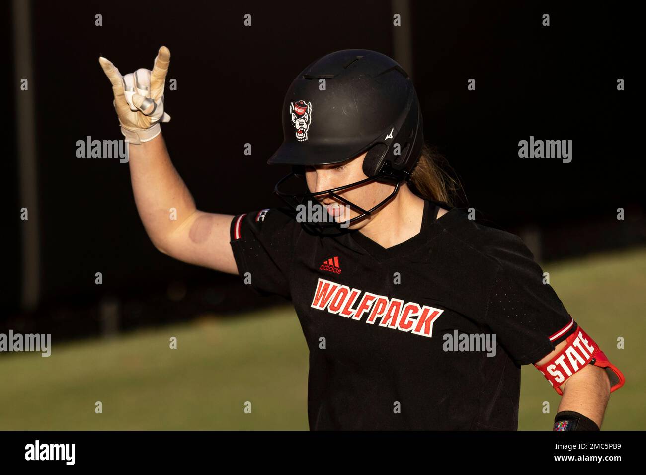 NC State infielder Miranda Farricker #13 gestures after hitting a home ...