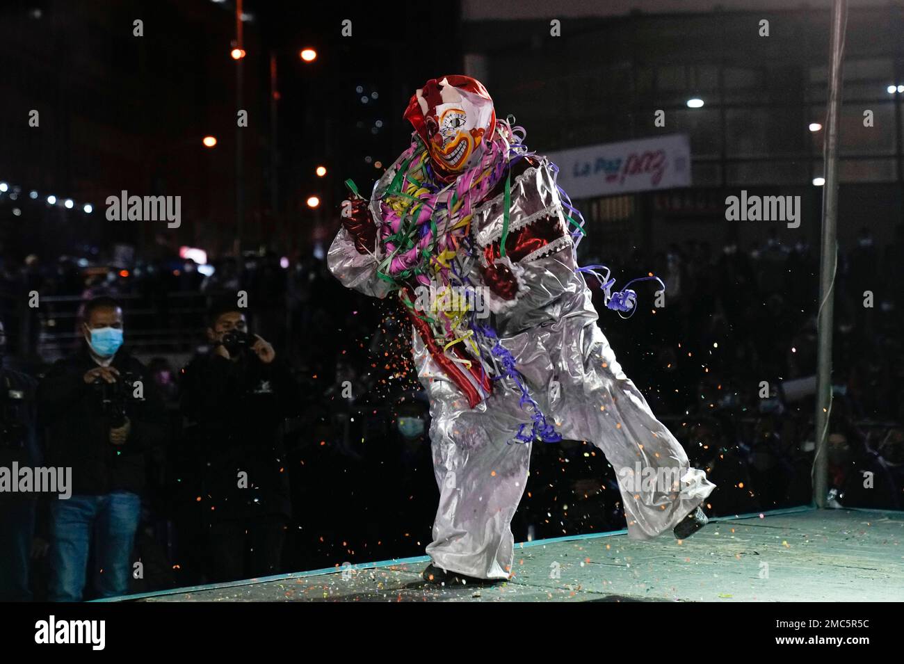 A contestant dressed as the Carnival character Pepino shows off his ...