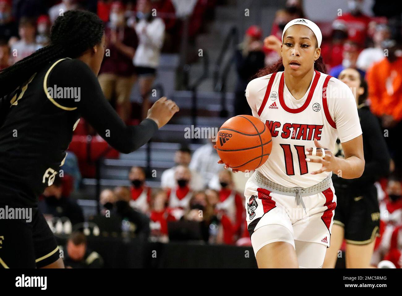 North Carolina State's Jakia Brown-Turner (11) brings the ball up the court against Wake Forest ...