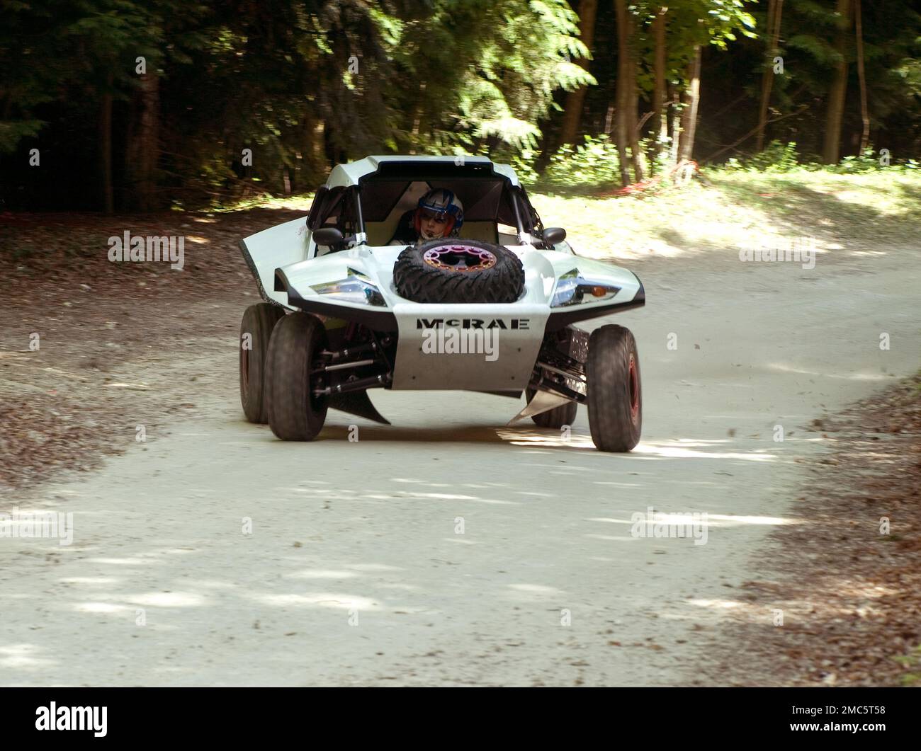 Colin McRea driving his self designed rally car on the rally stage at ...