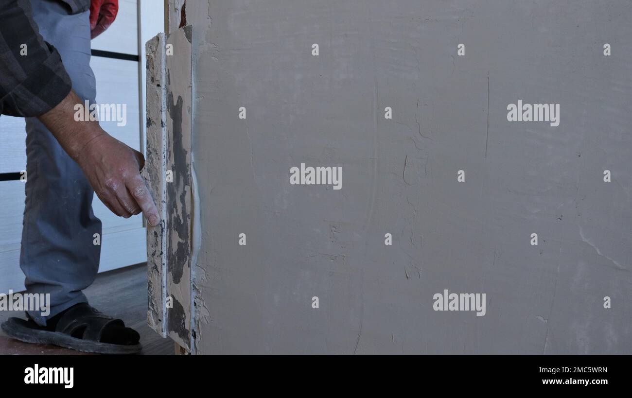 construction background with copy space on freshly plastered wall and ...