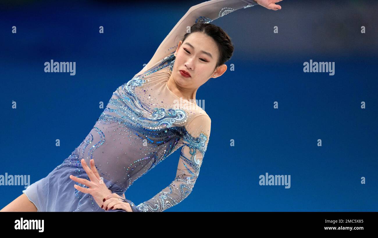 Peng Cheng and Jin Yang, of China, compete in the pairs short program ...