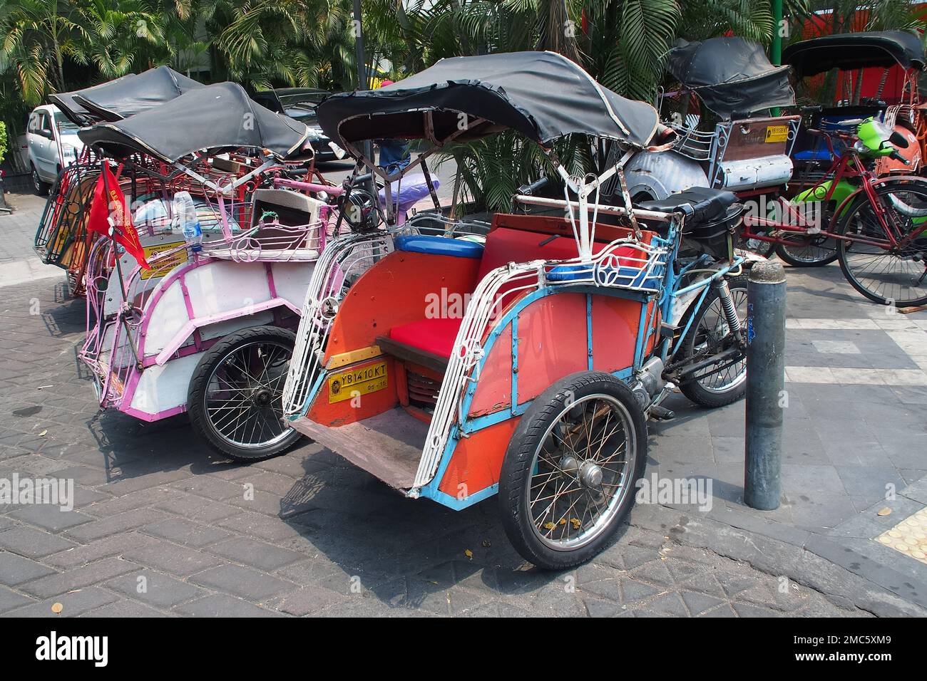 motorcycle rickshaws, Malioboro street,city skyline, Yogyakarta, Java ...