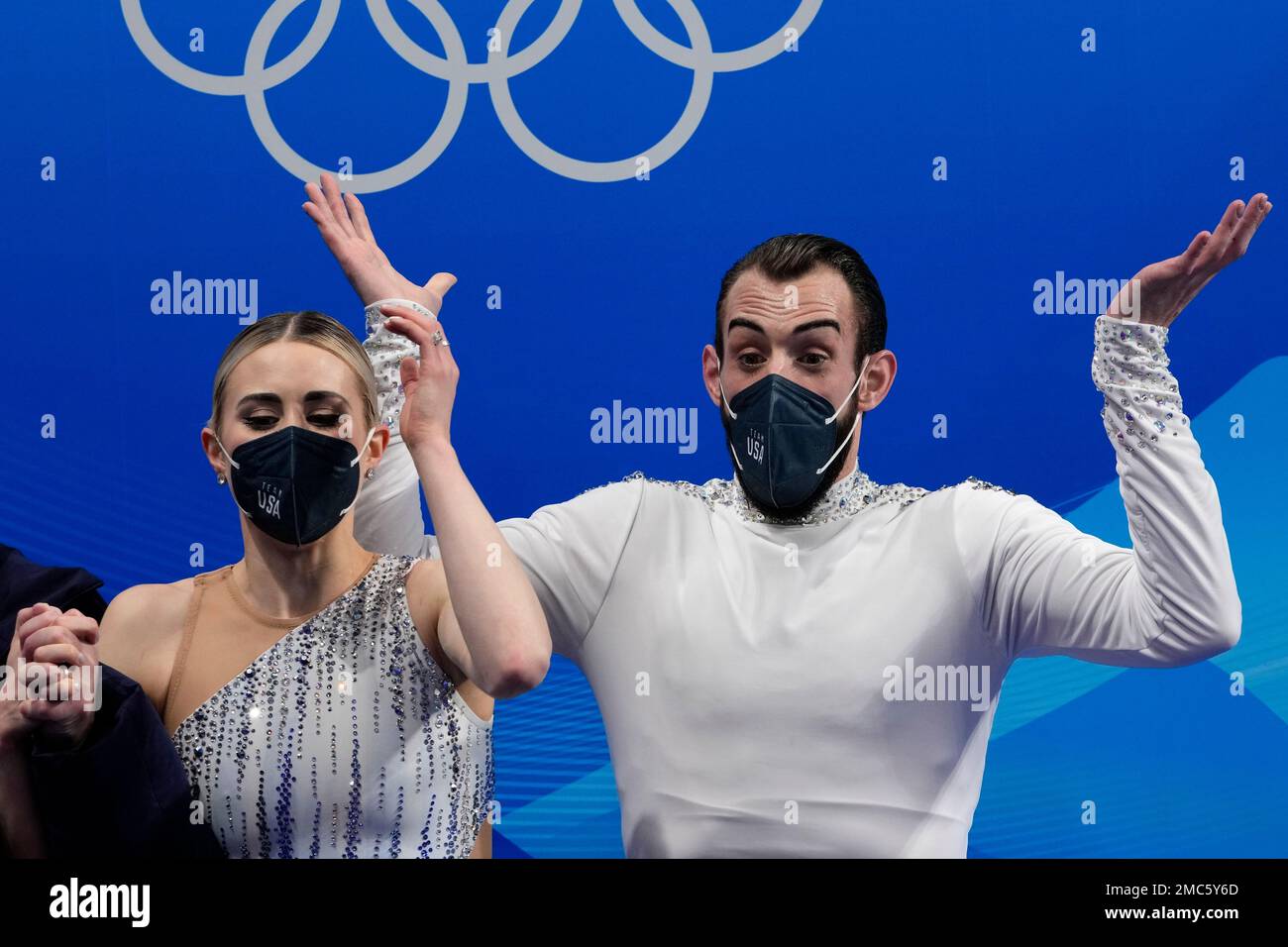 Ashley Cain-Gribble and Timothy Leduc, of the United States, react ...