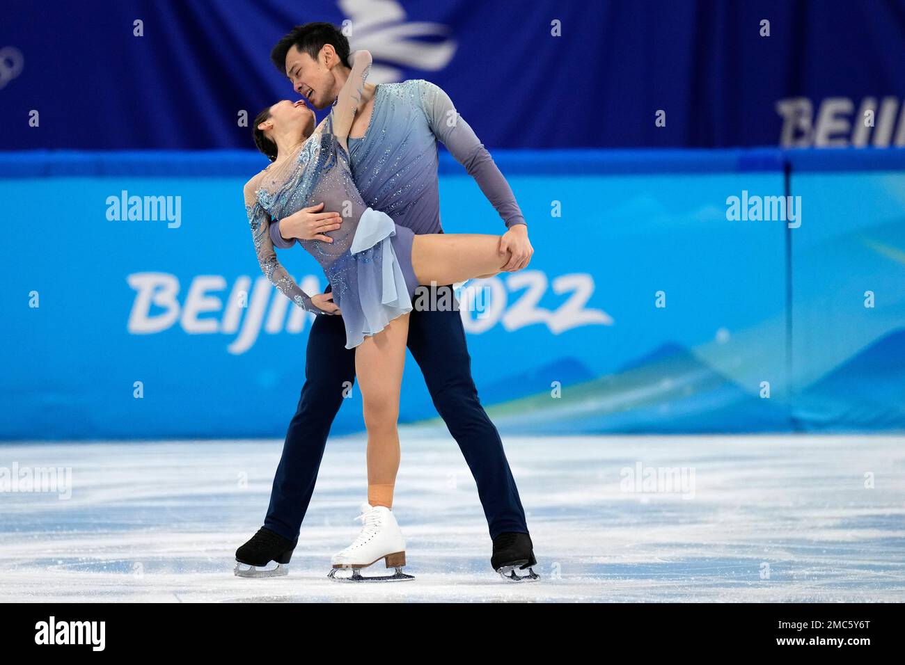 Peng Cheng and Jin Yang, of China, compete in the pairs short program ...
