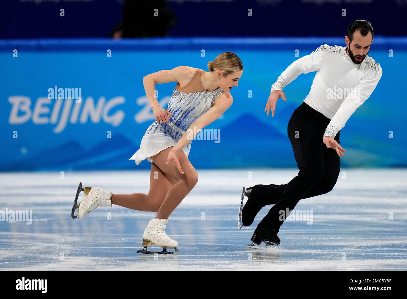 Ashley Cain-Gribble and Timothy Leduc, of the United States, compete in ...