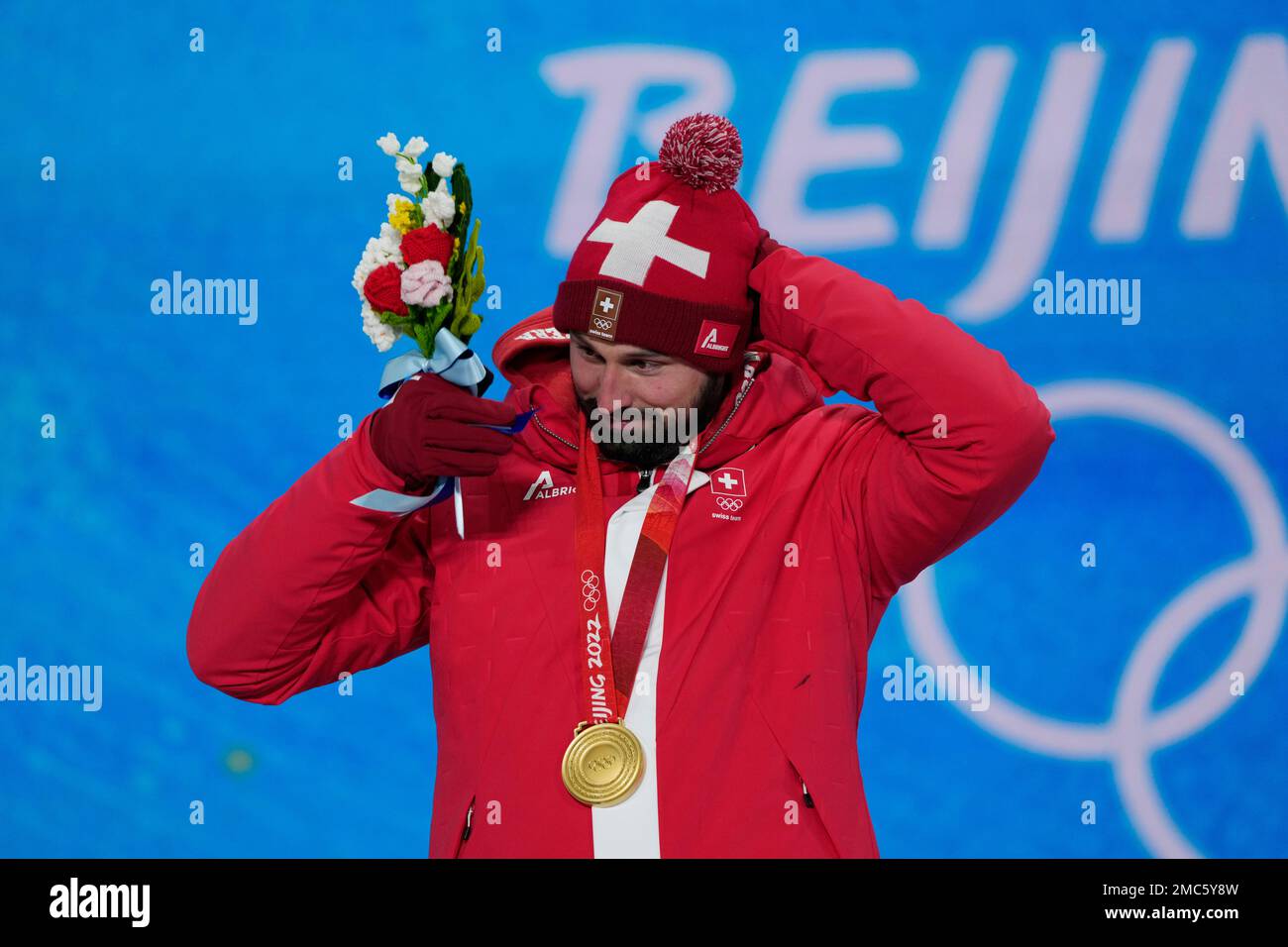 Gold medalist Switzerland's Ryan Regez celebrates during a medal ...