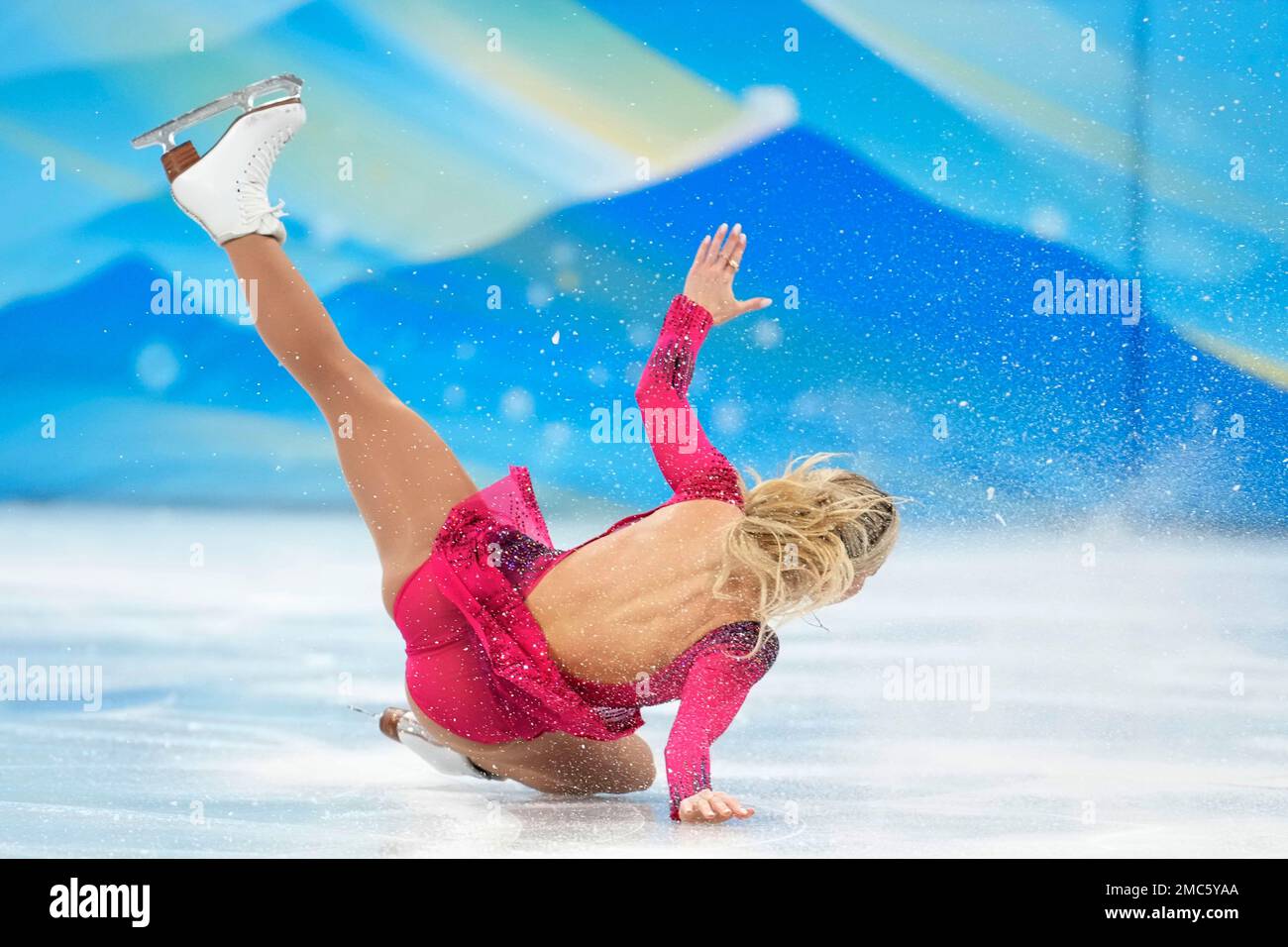 Kirsten Moore-Towers falls as she and partner Michael Marinaro, of ...
