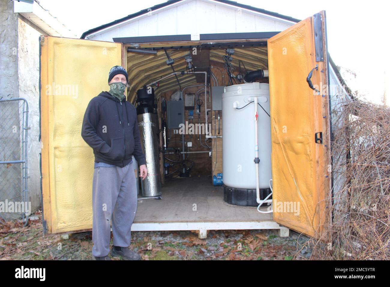 In this Jan. 4, 2022, Tim Maye stands next to the shed outside his home ...