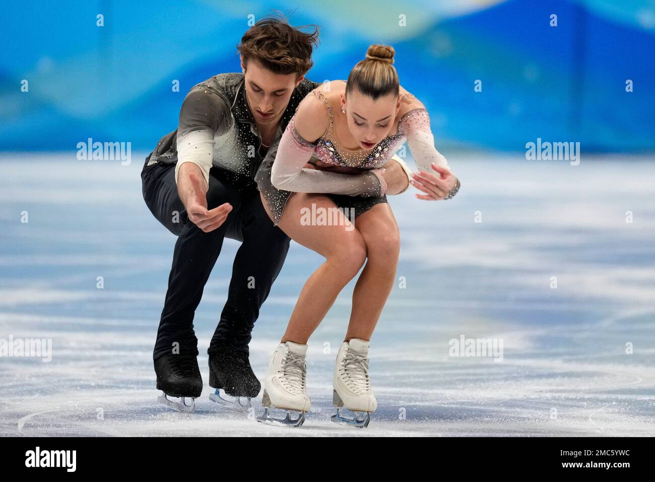 Laura Barquero and Marco Zandron, of Spain, compete in the pairs short ...