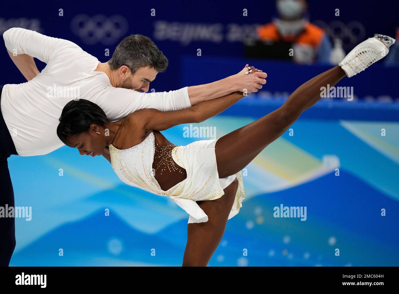 Vanessa James and Eric Radford, of Canada, compete in the pairs short ...