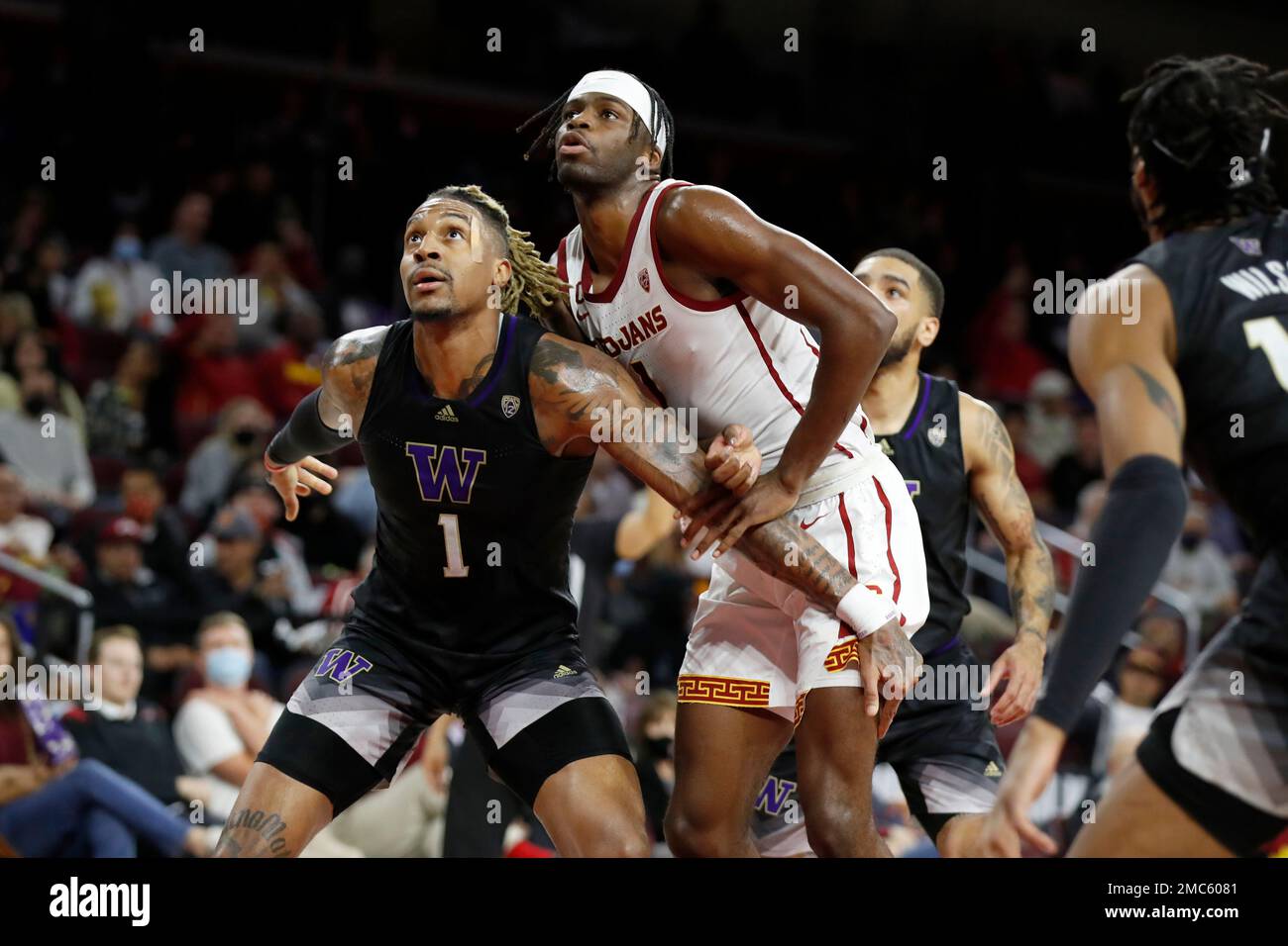 Washington forward Nate Roberts, left, boxes out Southern California ...