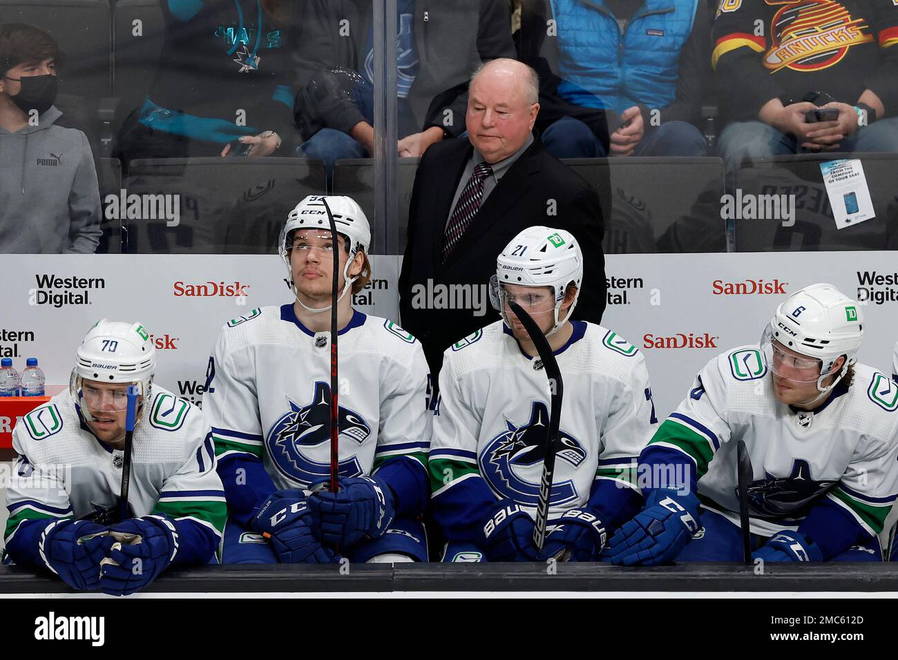 Vancouver Canucks head coach Bruce Boudreau watches during the third ...