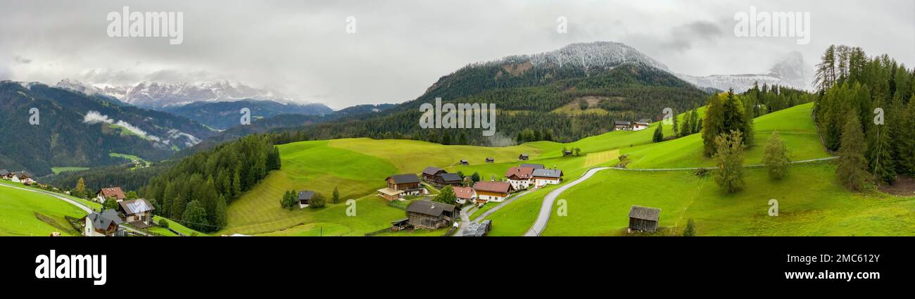 Scenic alpine landscape with village and pastures in South Tirol, Italy ...