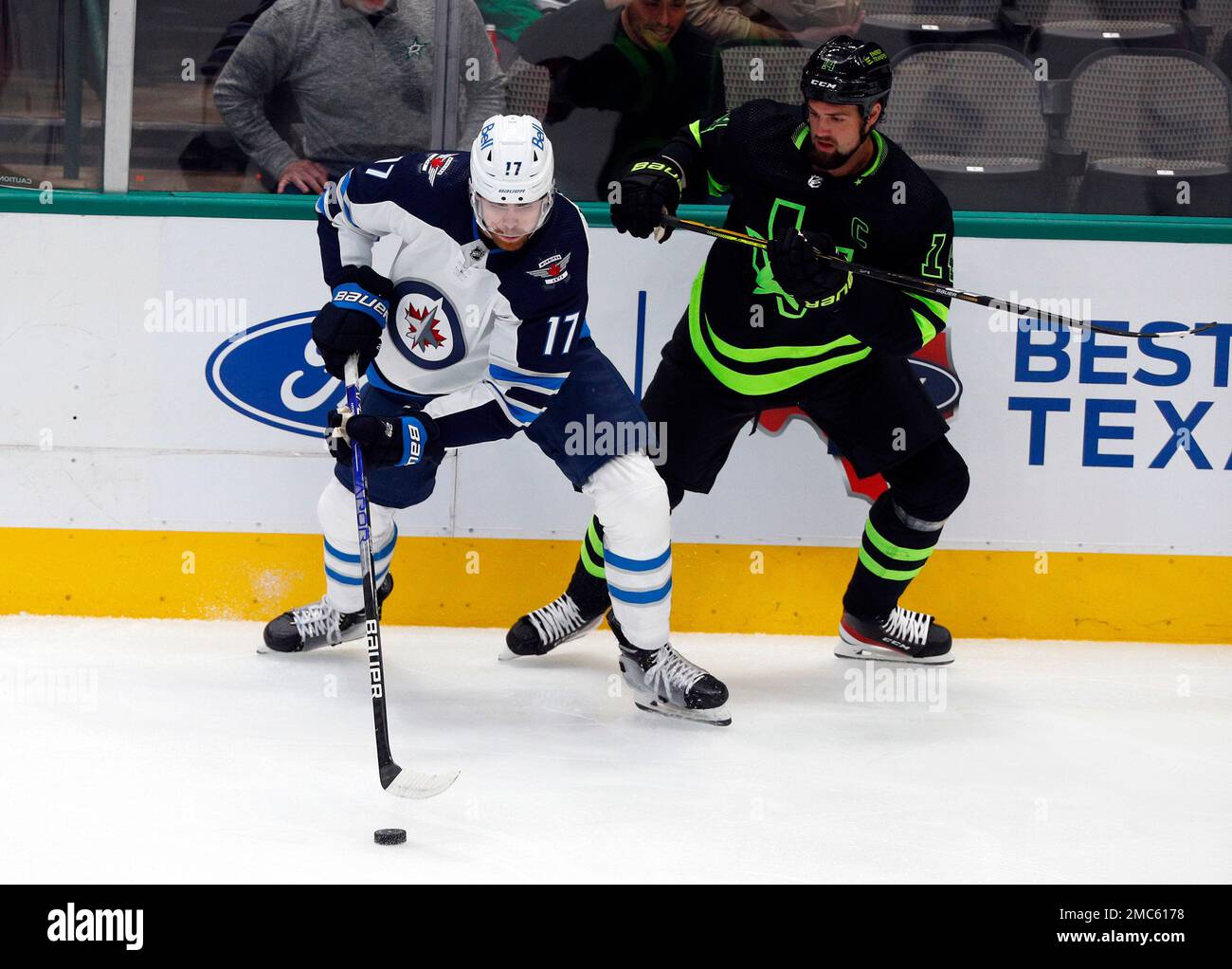 Winnipeg Jets center Adam Lowry (17) and Dallas Stars left wing Jamie ...