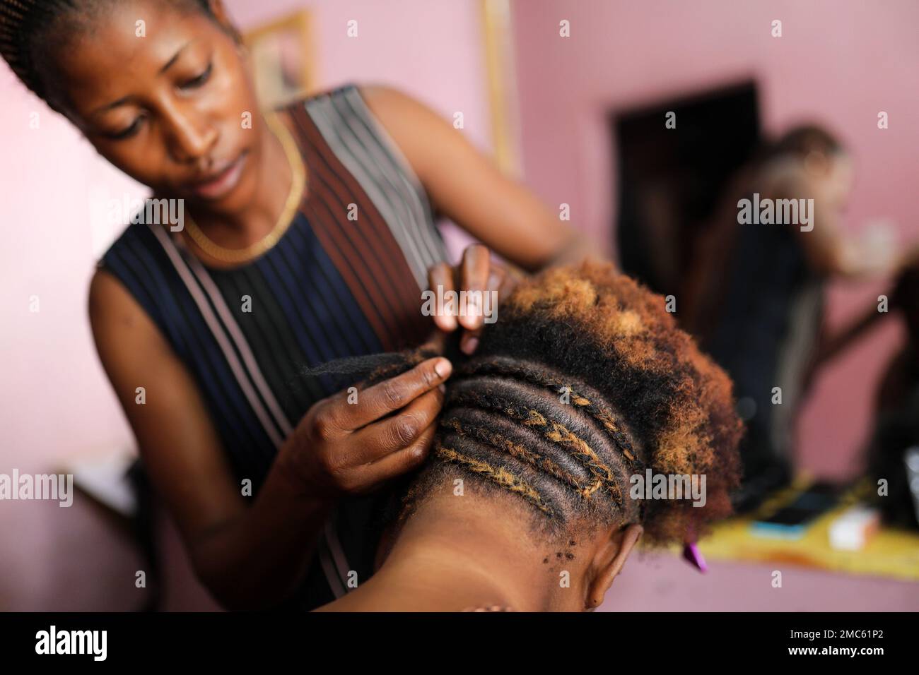 Ndola, Zambia. 21st Jan, 2023. Making African braids in Ndola, Zambia ...
