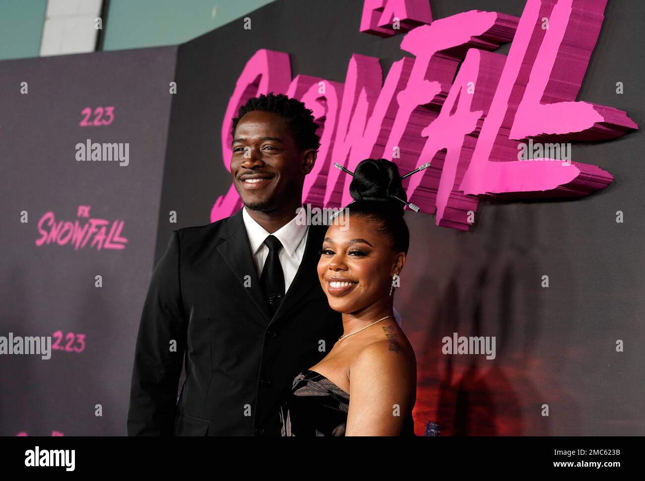 Damson Idris, left, and Gail Bean, cast members in "Snowfall," pose ...
