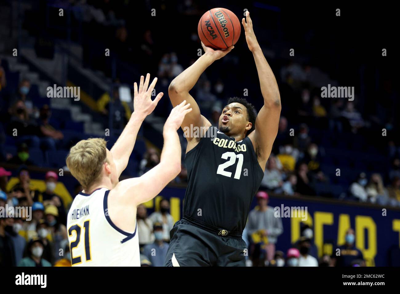 Colorado forward Evan Battey (21) shoots against California forward ...