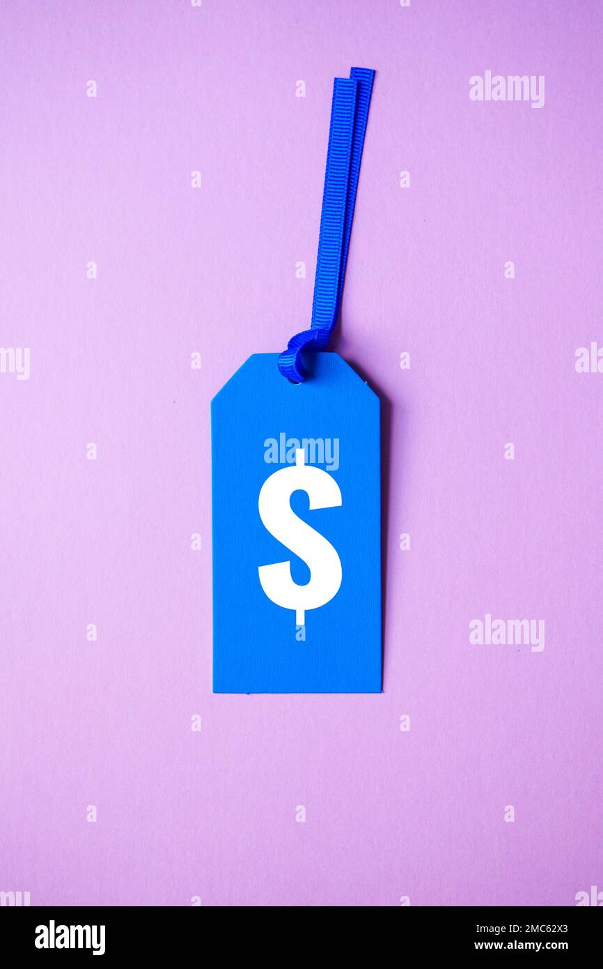 dollar symbol on the blue price tag Stock Photo - Alamy