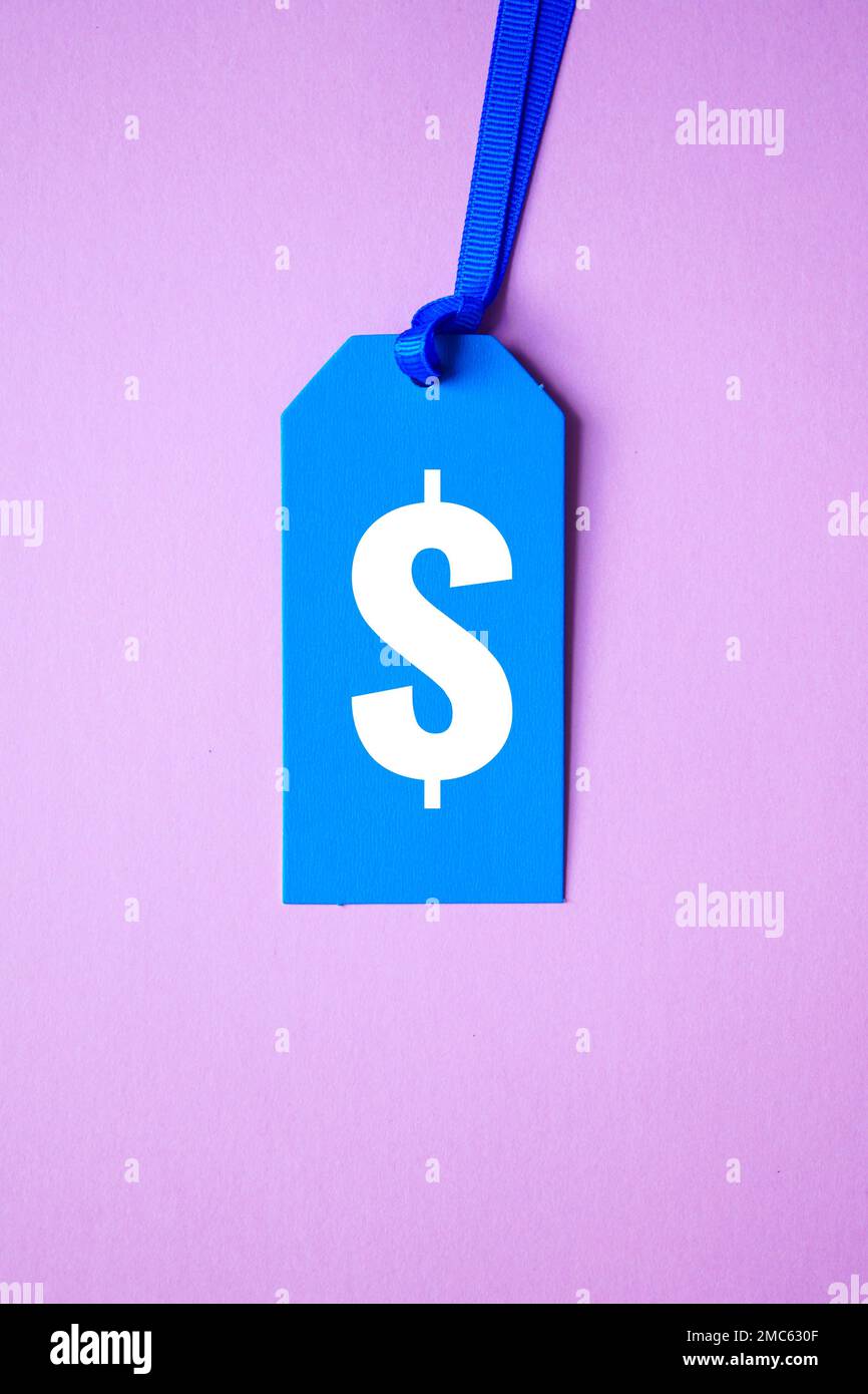 dollar symbol on the blue price tag Stock Photo - Alamy