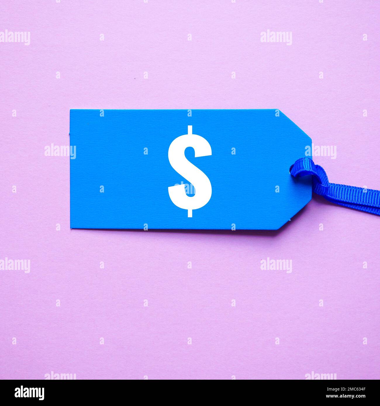 dollar symbol on the blue price tag Stock Photo - Alamy