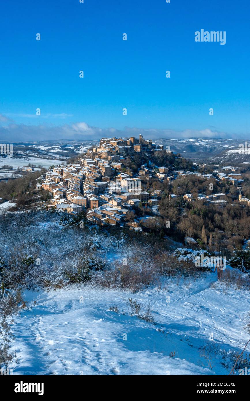 Portrait view of the southern French medieval hilltop village of Cordes ...