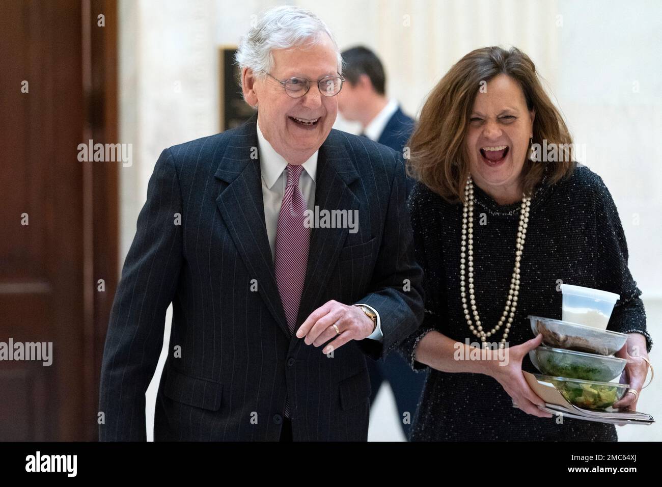 Senate Minority Leader Mitch McConnell of Ky., left, laughs with top ...