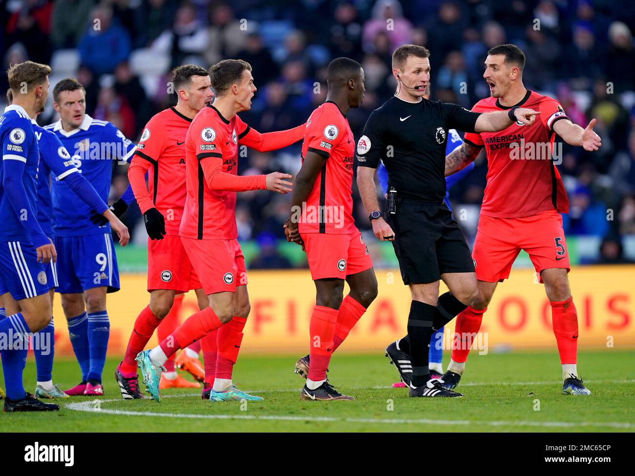 Brighton and Hove Albion's Lewis Dunk (right) appeals to referee Thomas ...