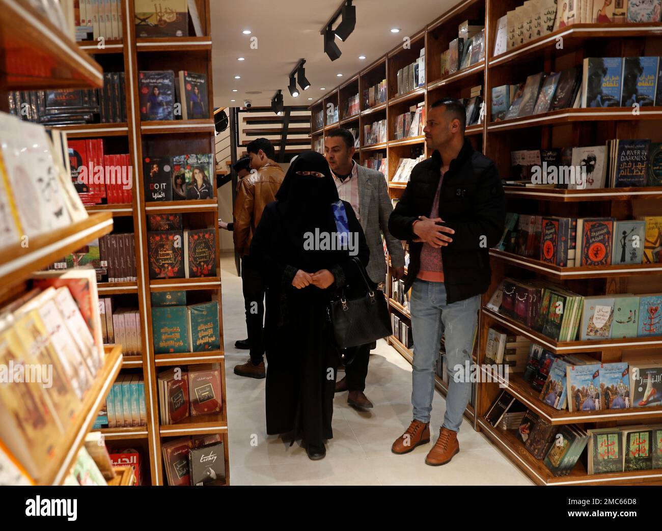 People browse bookshelves at the Samir Mansour Bookstore that was ...