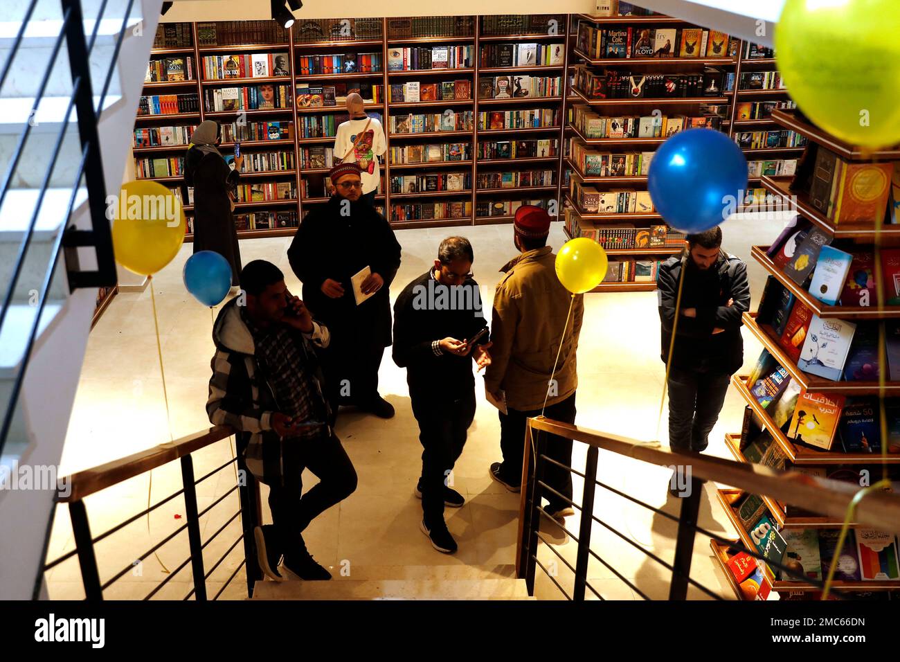 People browse bookshelves at the Samir Mansour Bookstore that was ...