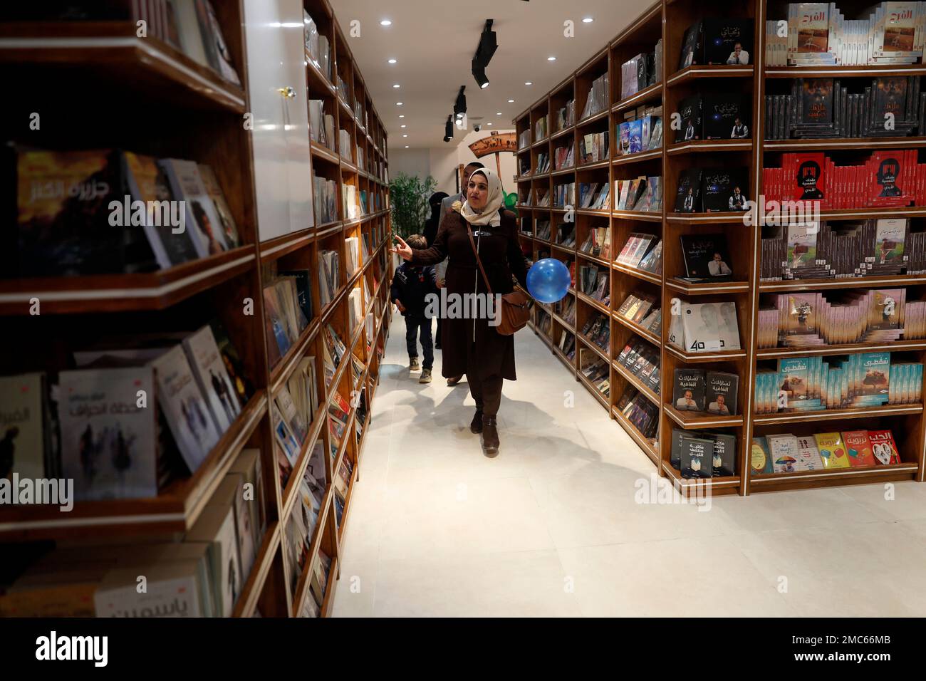 People browse bookshelves at the Samir Mansour Bookstore that was ...