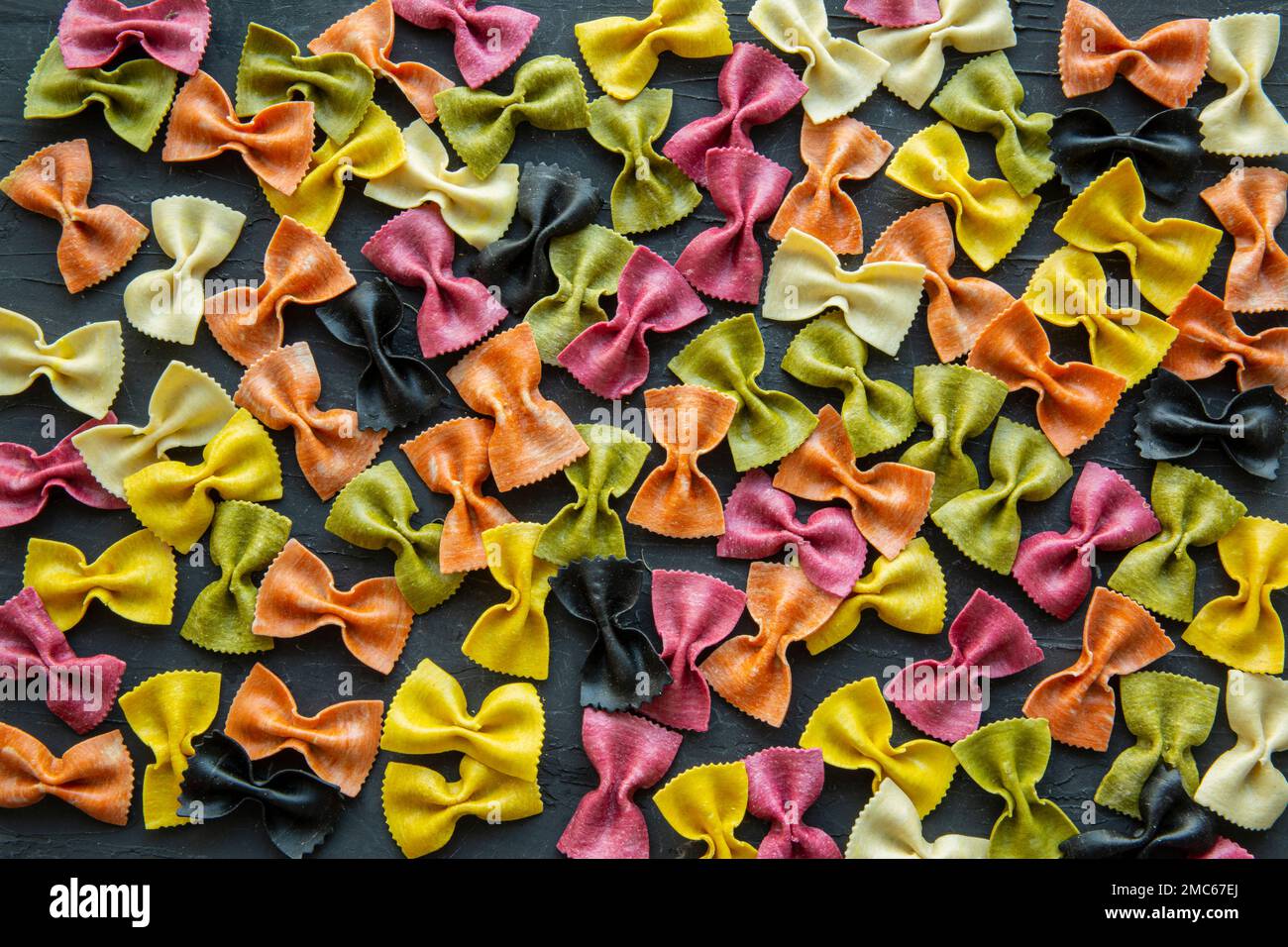 Assortment of different kind of dry pasta background, top view ...