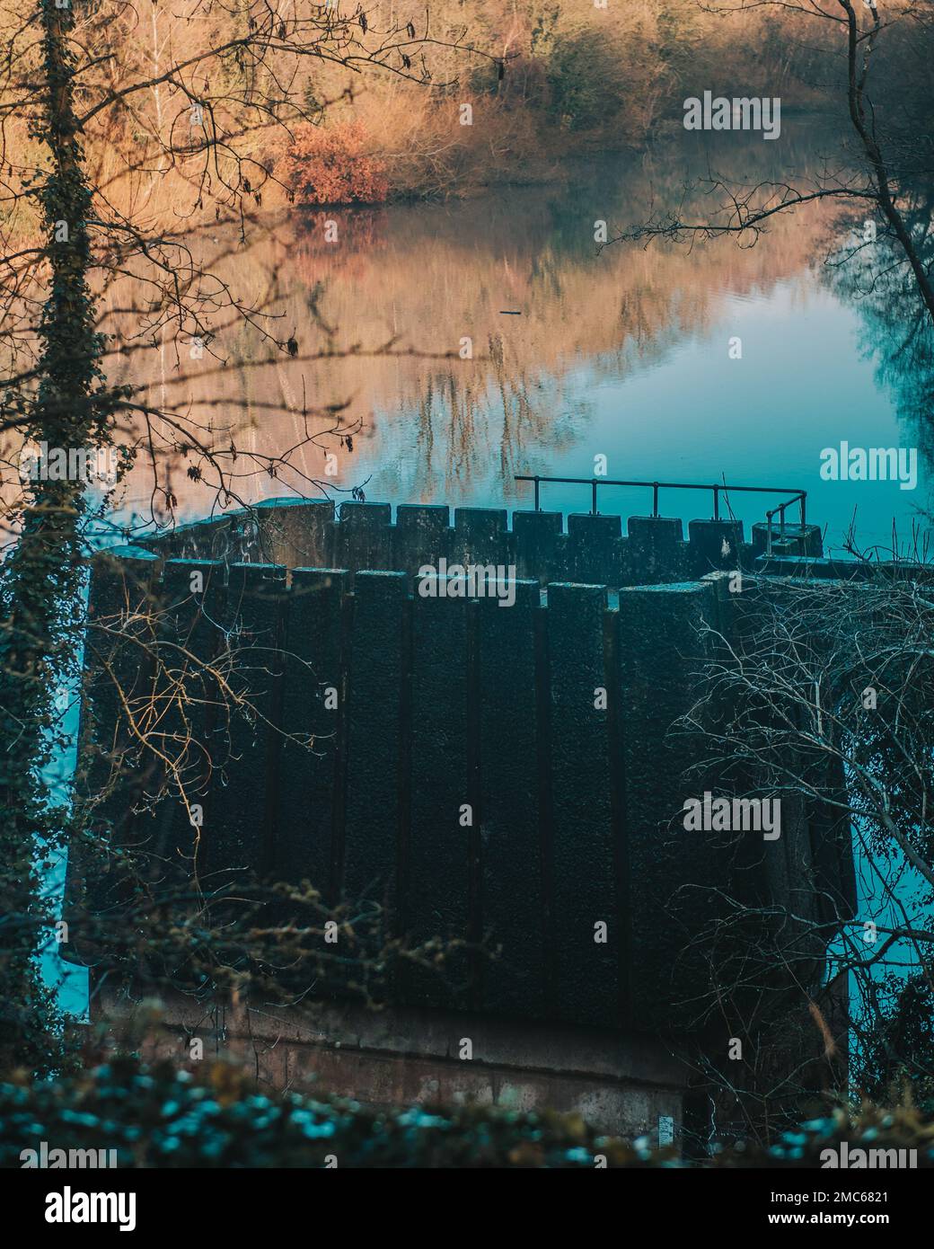 An old hidden tower in a lake Stock Photo - Alamy