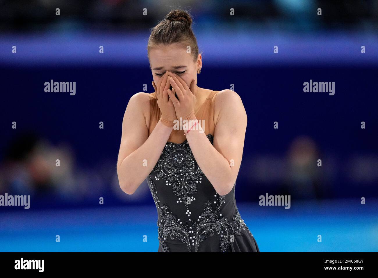 Anastasiia Gubanova, of Georgia, reacts after the women's free skate ...