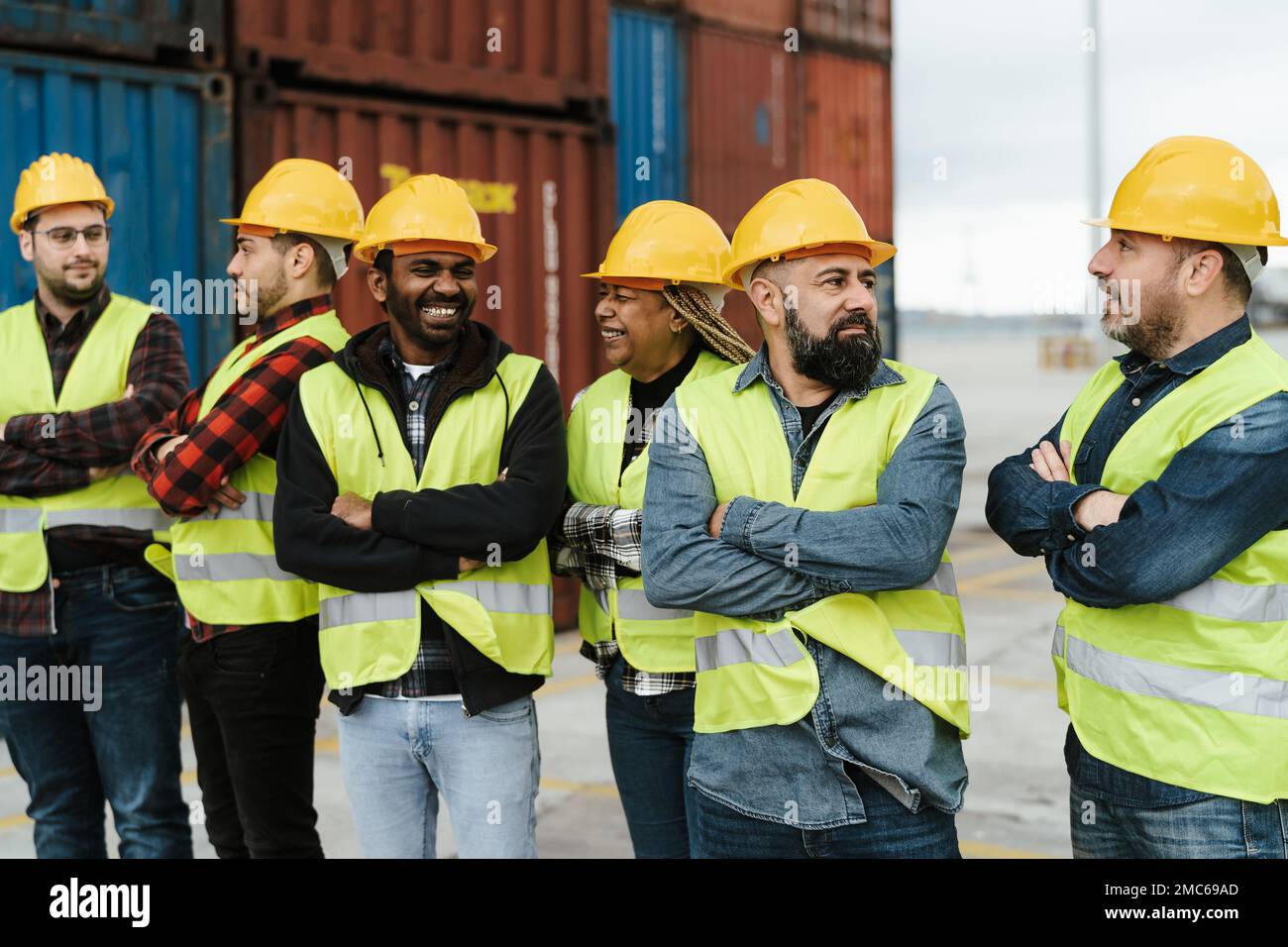 Industrial engineers working in logistic terminal of container cargo ...