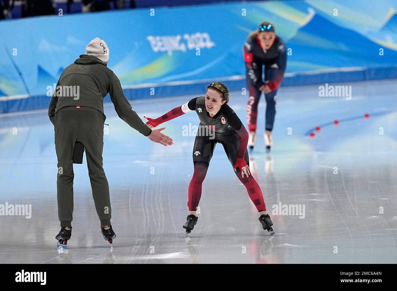 Alexa Scott of Canada reacts after her heat in the women's speedskating ...