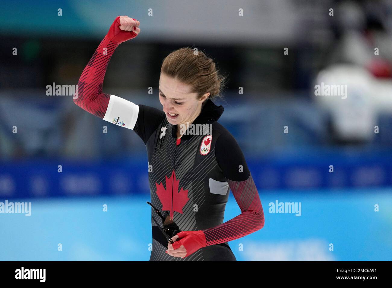 Alexa Scott of Canada reacts after her heat in the women's speedskating ...