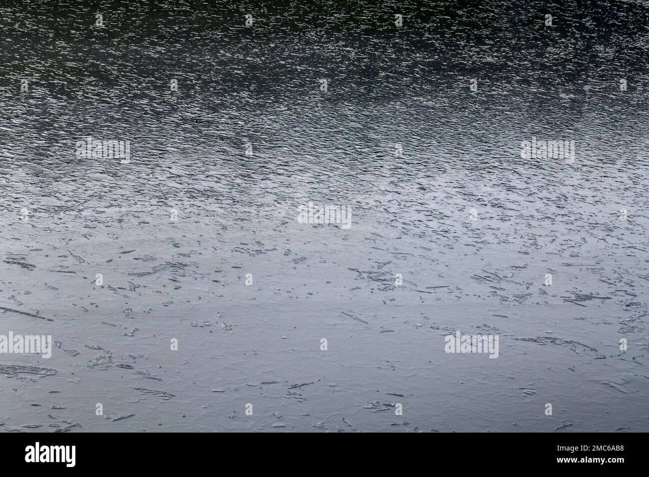 Frozen lake, structures of the water surface Stock Photo - Alamy