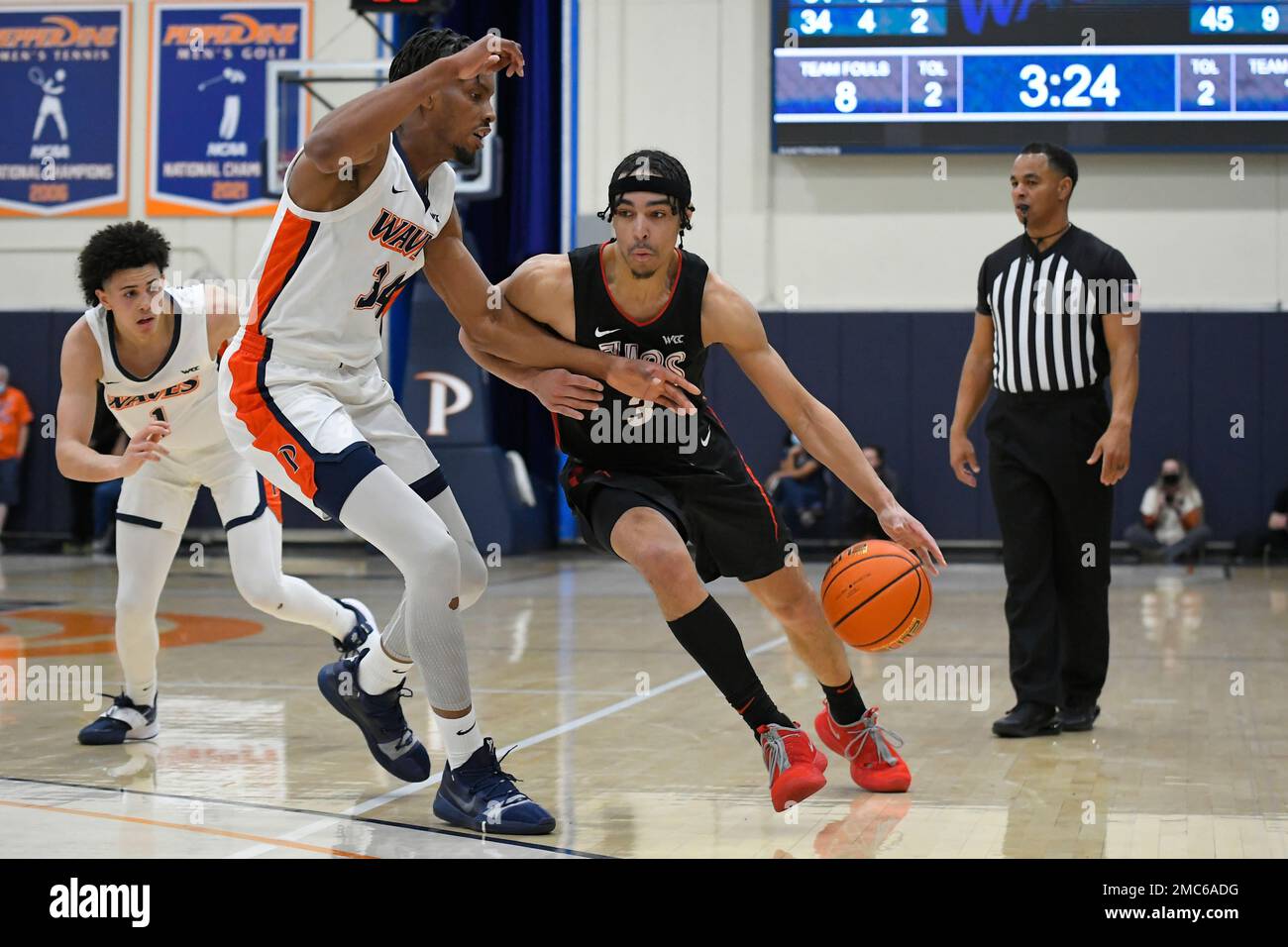 Pepperdine center Victor Ohia Obioha (34) guards Gonzaga guard Andrew Nembhard (3) during an ...